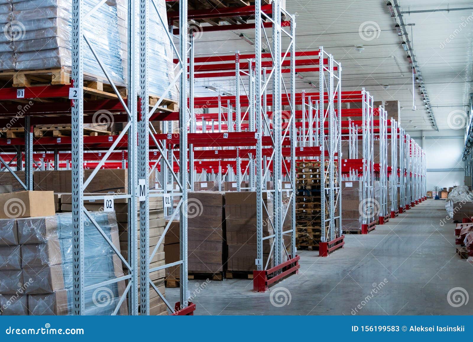 Storage Warehouse and Racks on Which There are Cardboard Boxes with ...