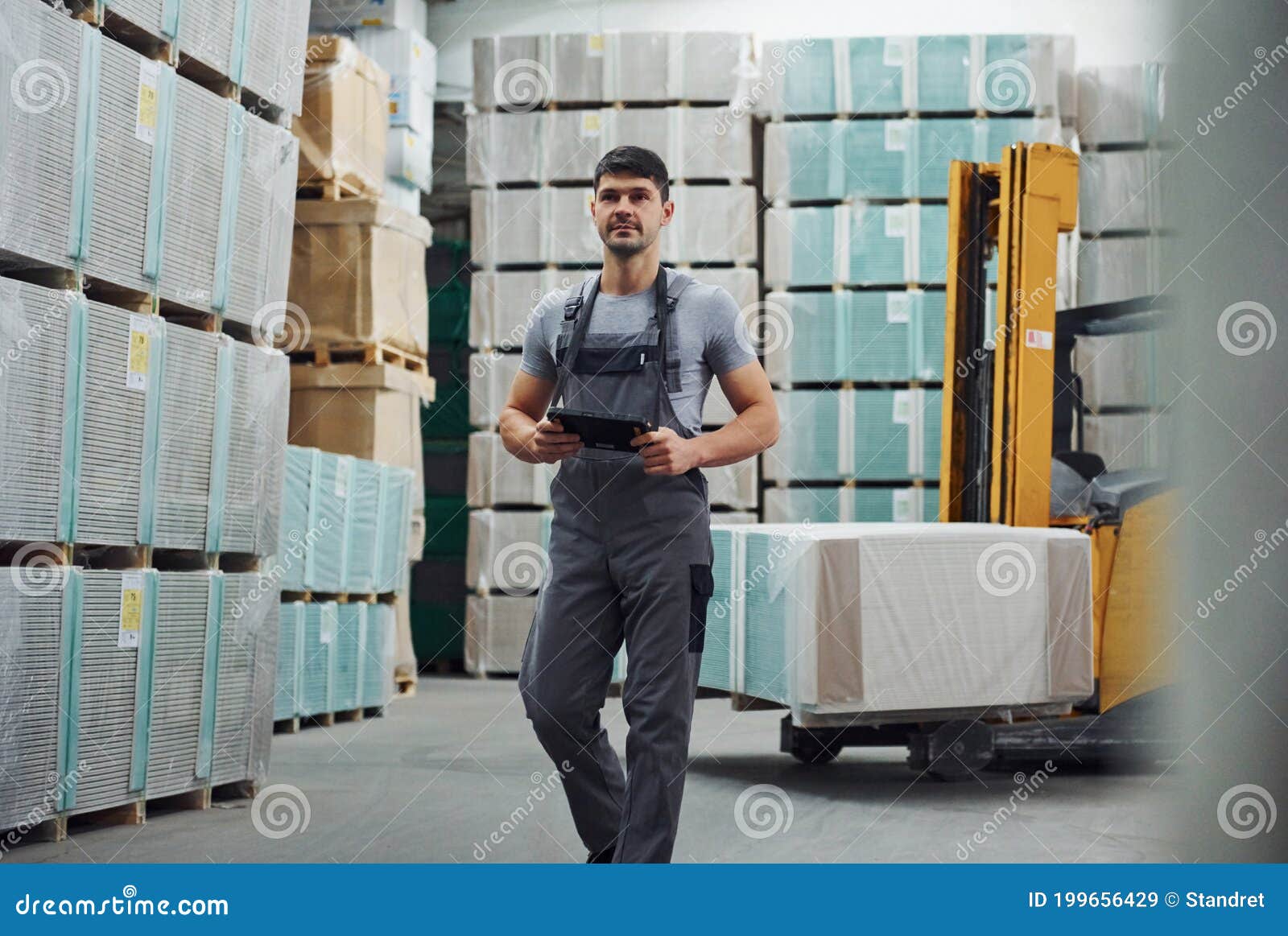Storage Worker Uniform Tablet Hands Checks Production Stock Photos ...