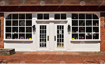 Store with display windows stock image. Image of window - 14245989