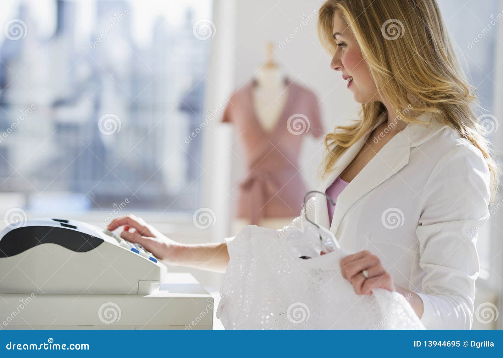 Store Employee Working Behind Register Stock Image - Image of ...