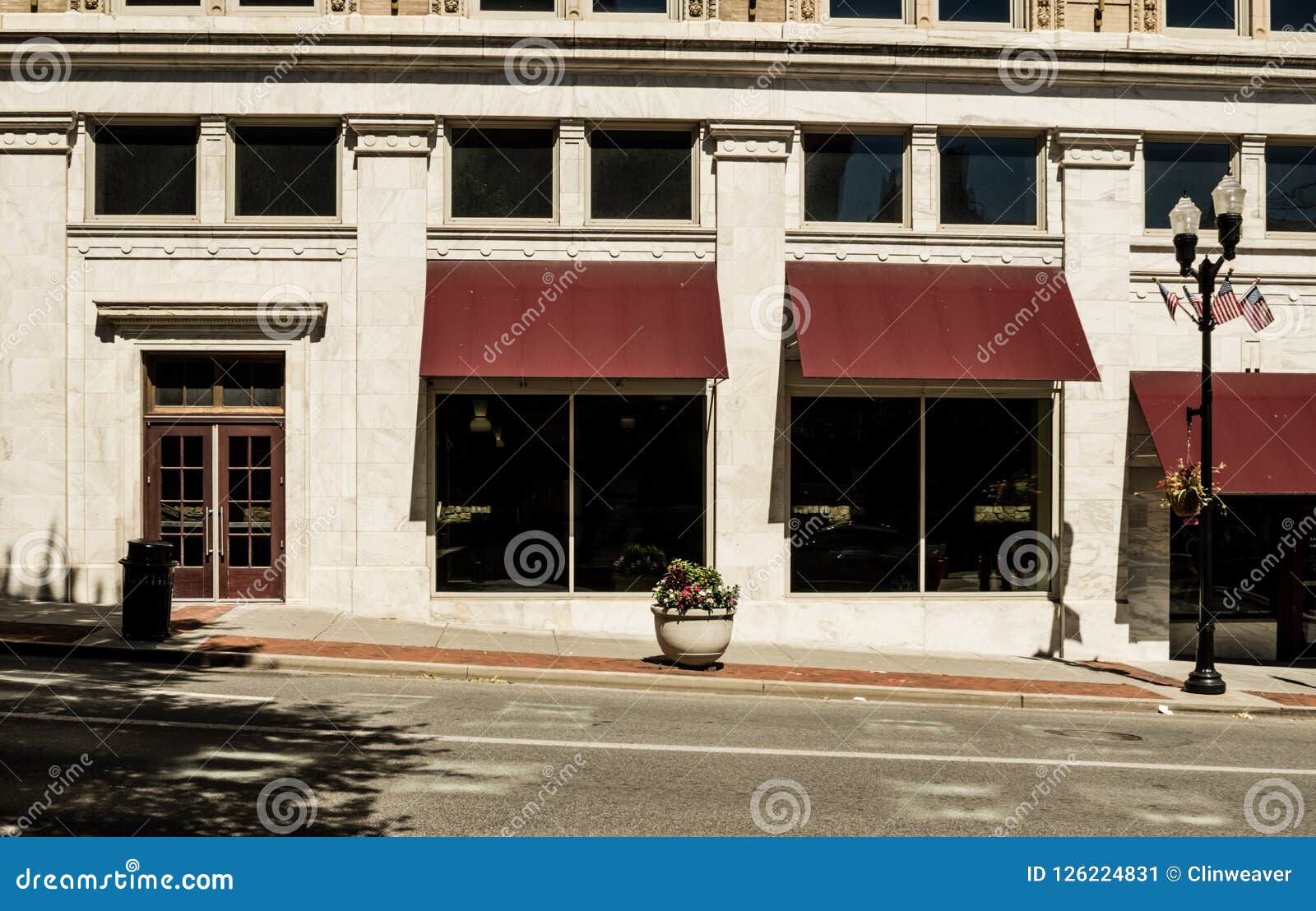Store Front Alongside a Street Stock Image - Image of shopping ...