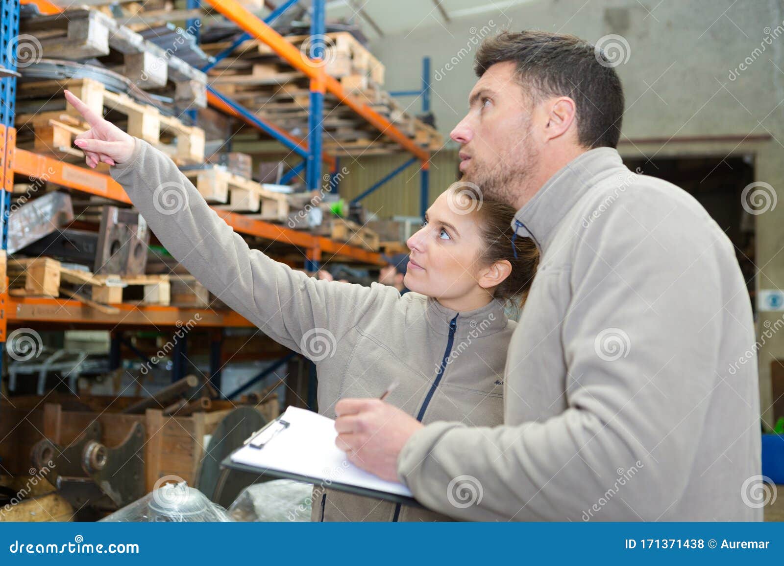 Store Manager with Warehouseman Checking Goods Reception Stock Photo ...