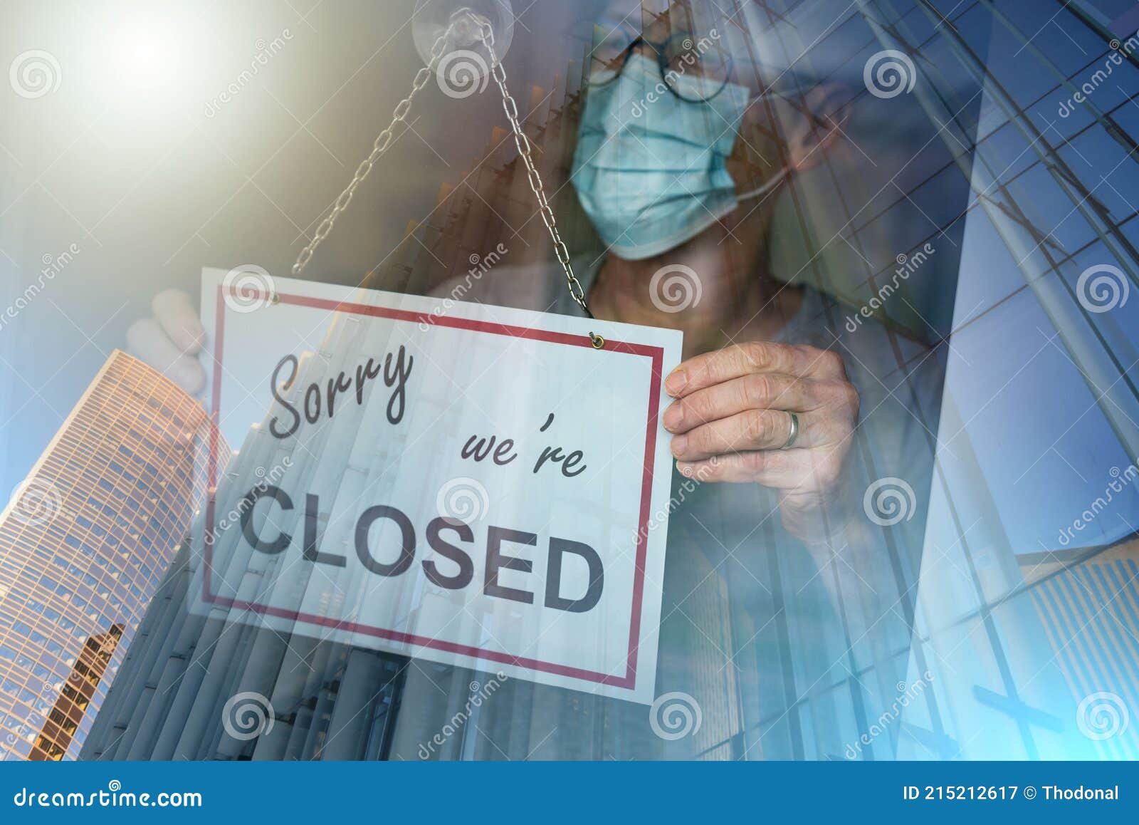 Store Owner Hanging Closed Sign on Window; Multiple Exposure Stock ...