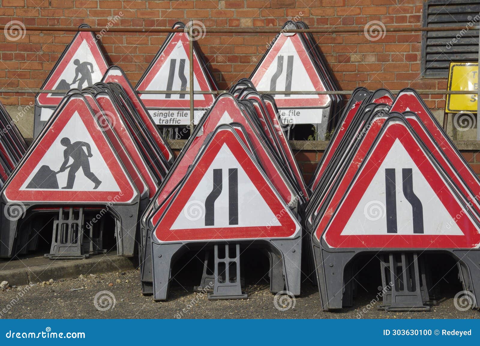 A Store of Triangular Road Warning Signs Stock Photo - Image of work ...