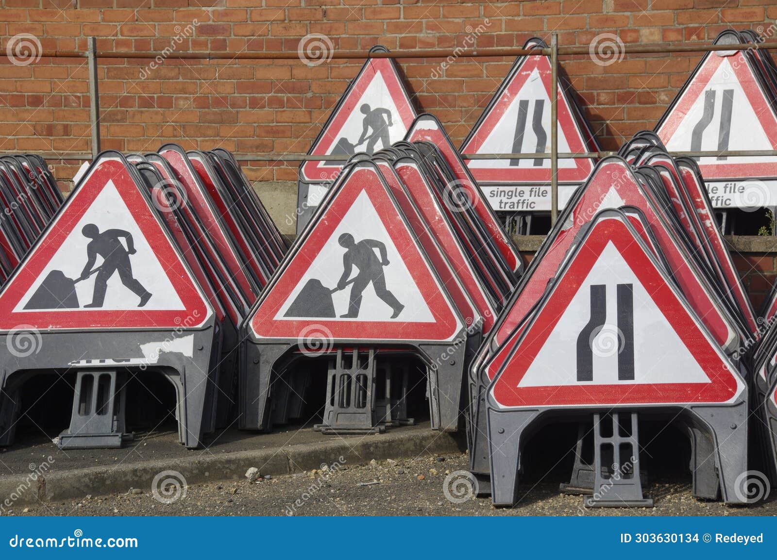 A Store of Triangular Road Warning Signs Stock Photo - Image of stored ...
