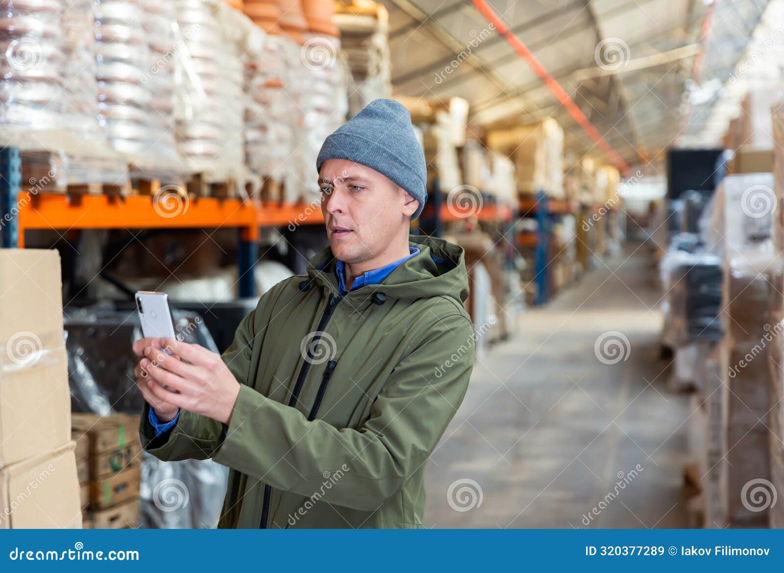Store Warehouse Employee Scans Barcode on Boxes Using Phone Stock Image ...
