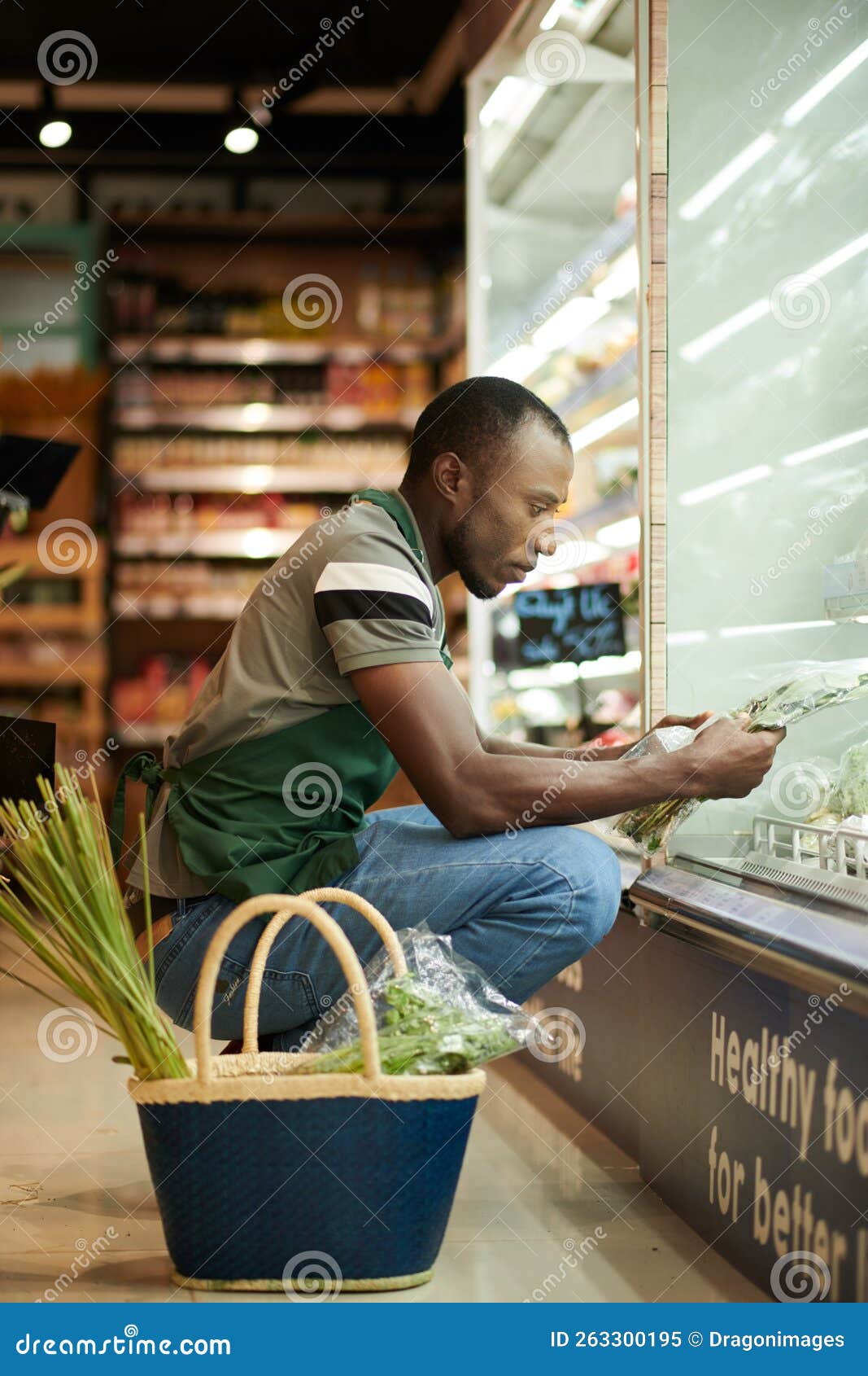 Store Worker Checking Expiration Date Stock Image - Image of apron ...