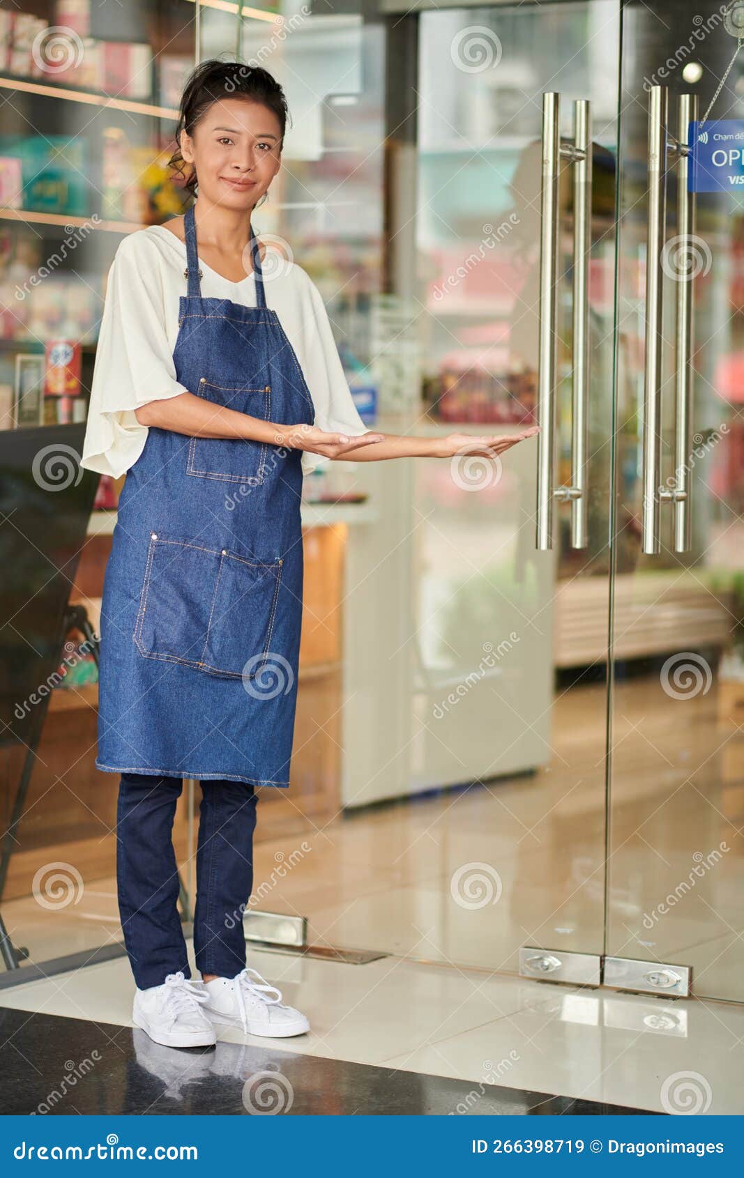 Store Worker Inviting Customers Stock Image - Image of working ...