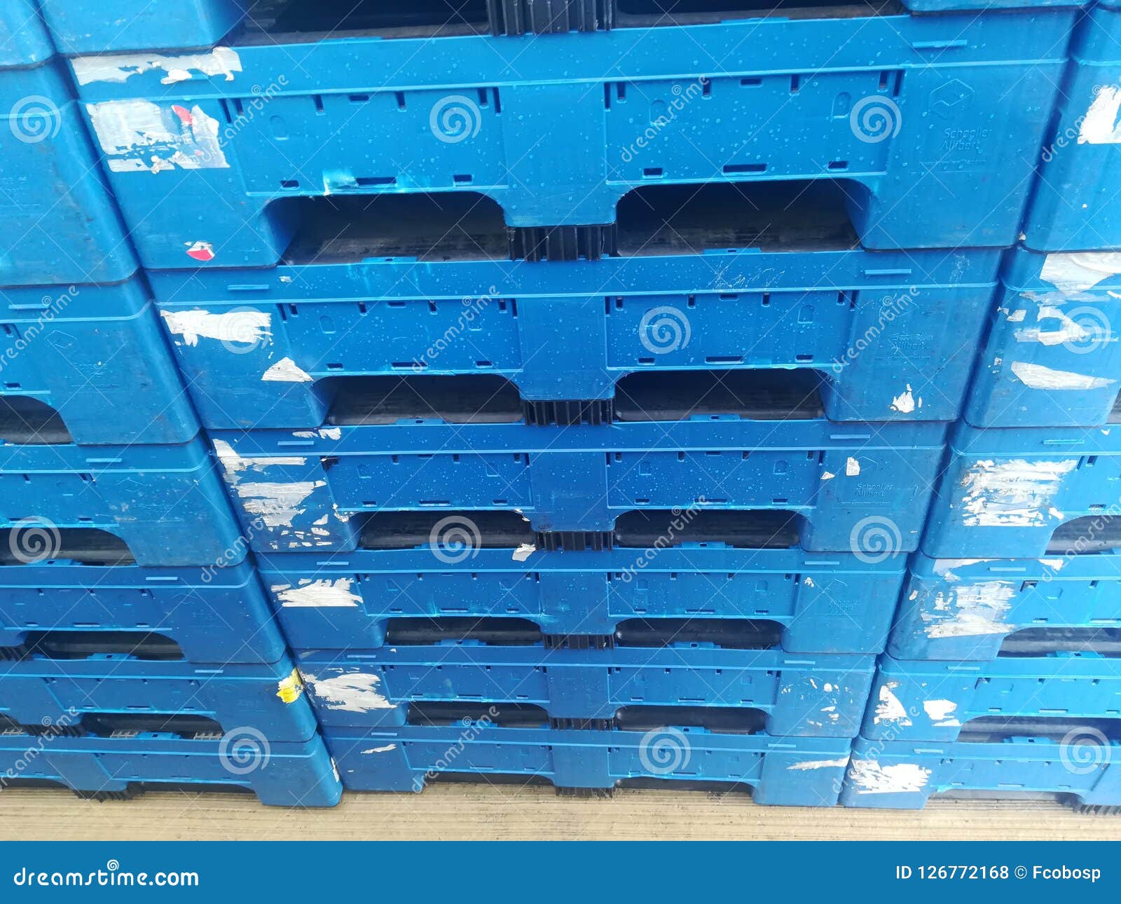 Stacked plastic pallets stock photo. Image of industry - 126772168