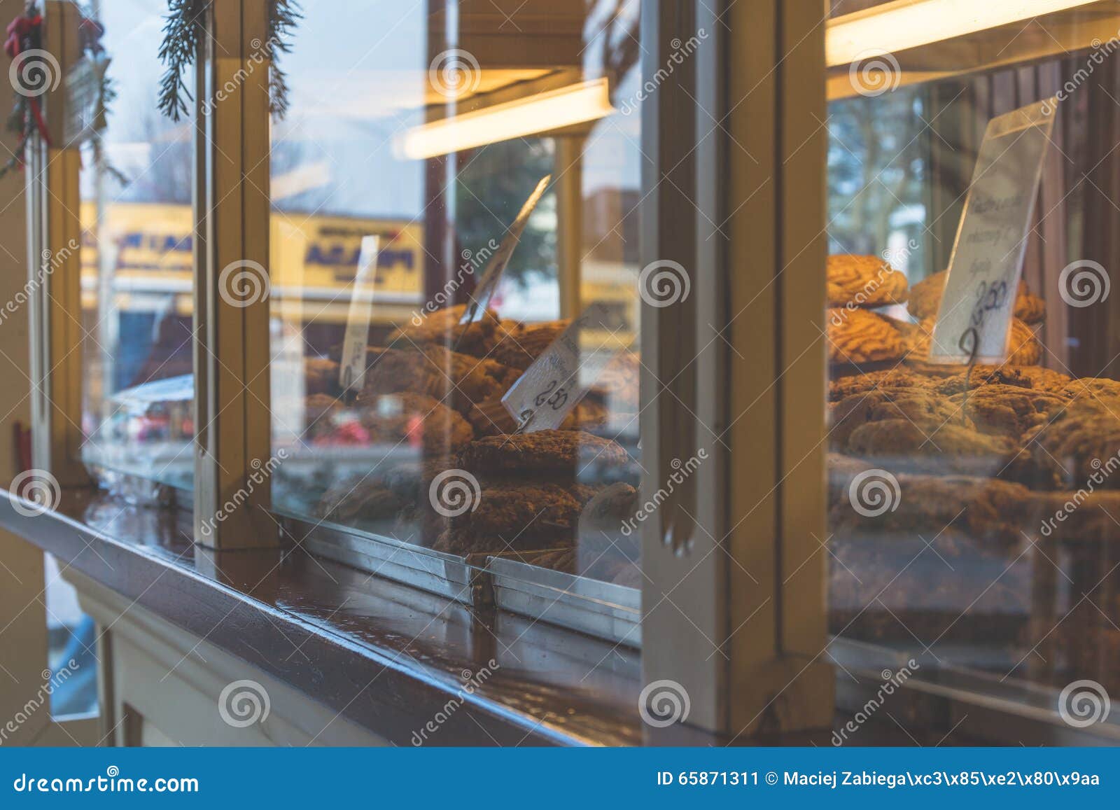 Storefront with cookies stock image. Image of eating - 65871311