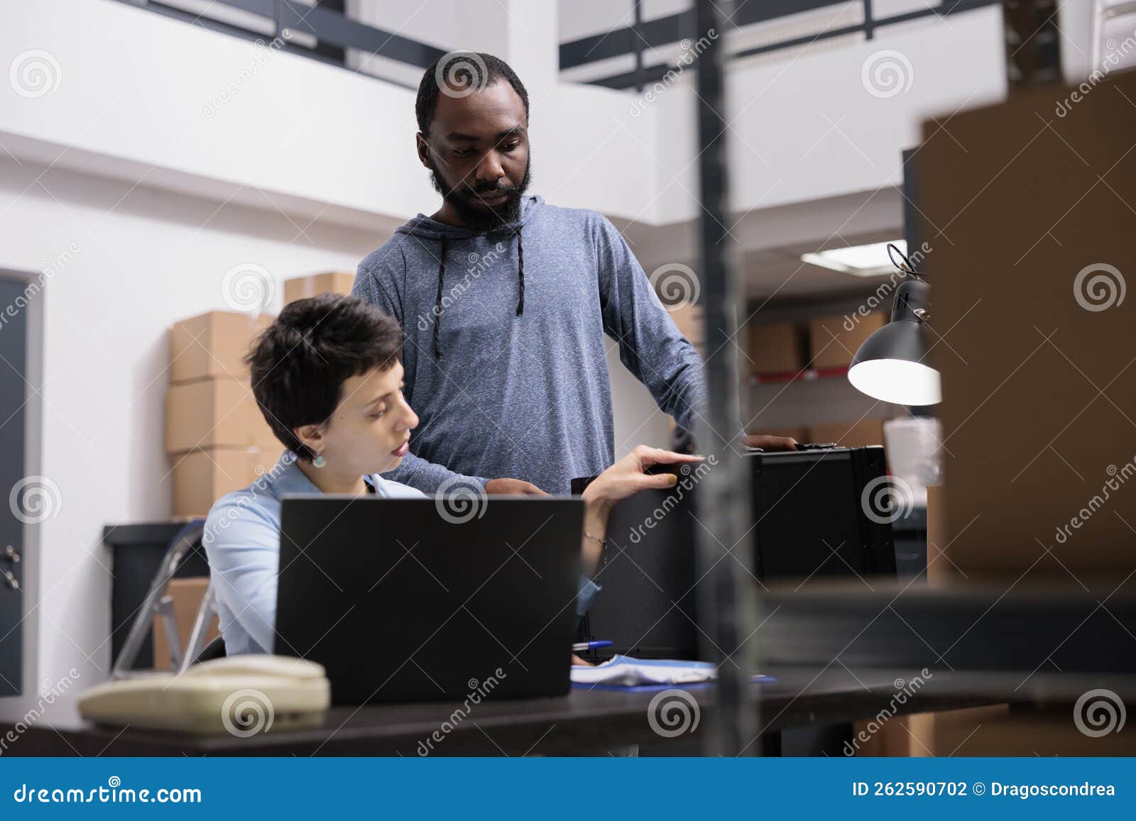Storehouse Delivery Team Looking at Metallic Box Checking Package Order ...