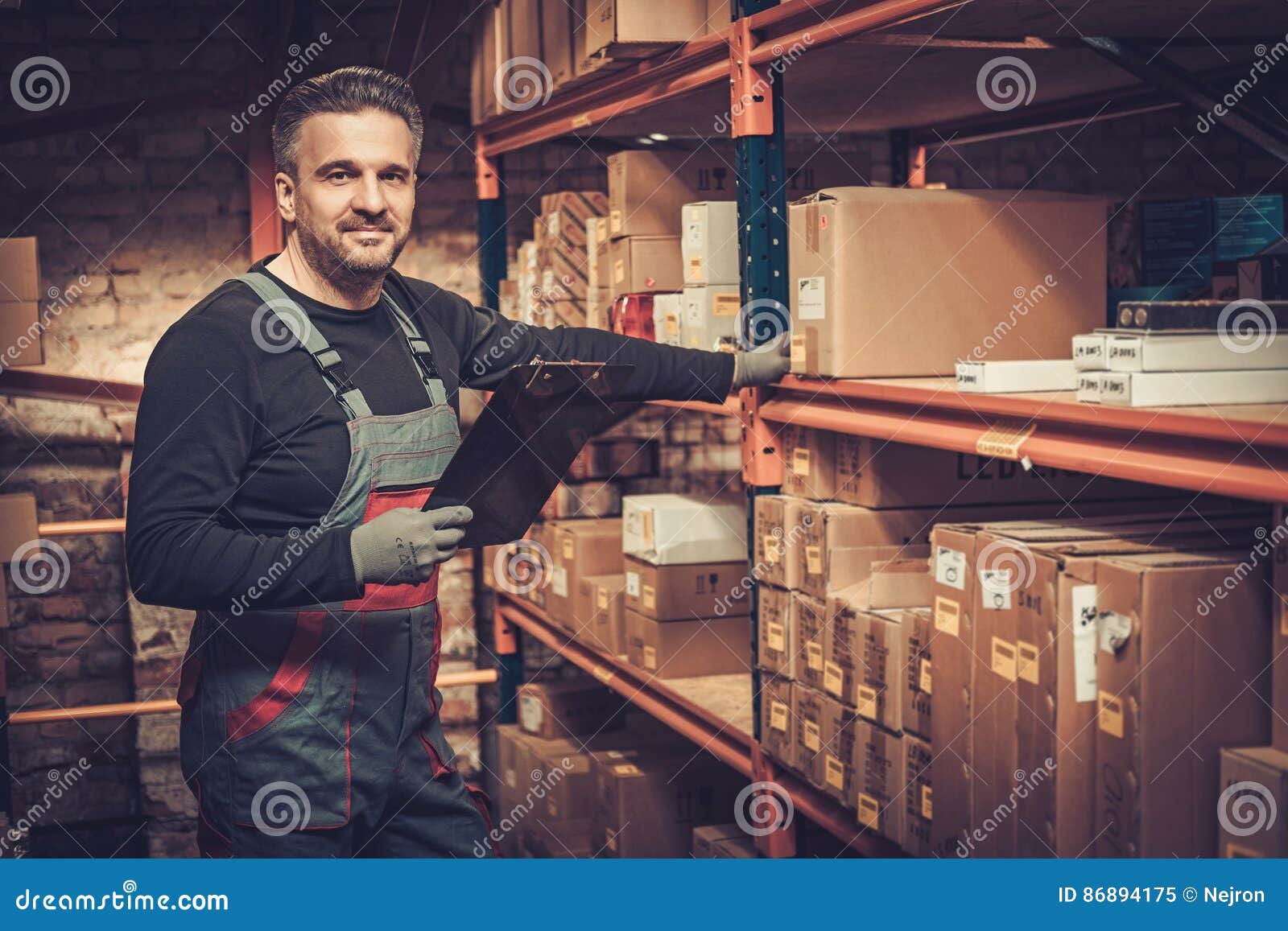Storekeeper with Manual Pick List on a Warehouse Stock Image - Image of ...