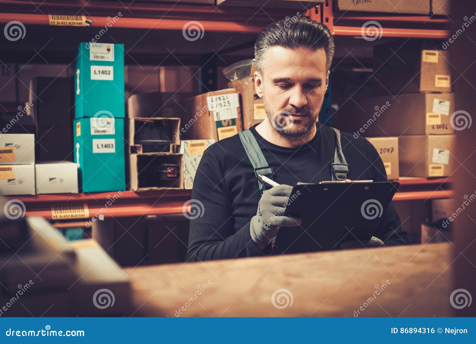 Storekeeper with Manual Pick List on a Warehouse Stock Photo - Image of ...