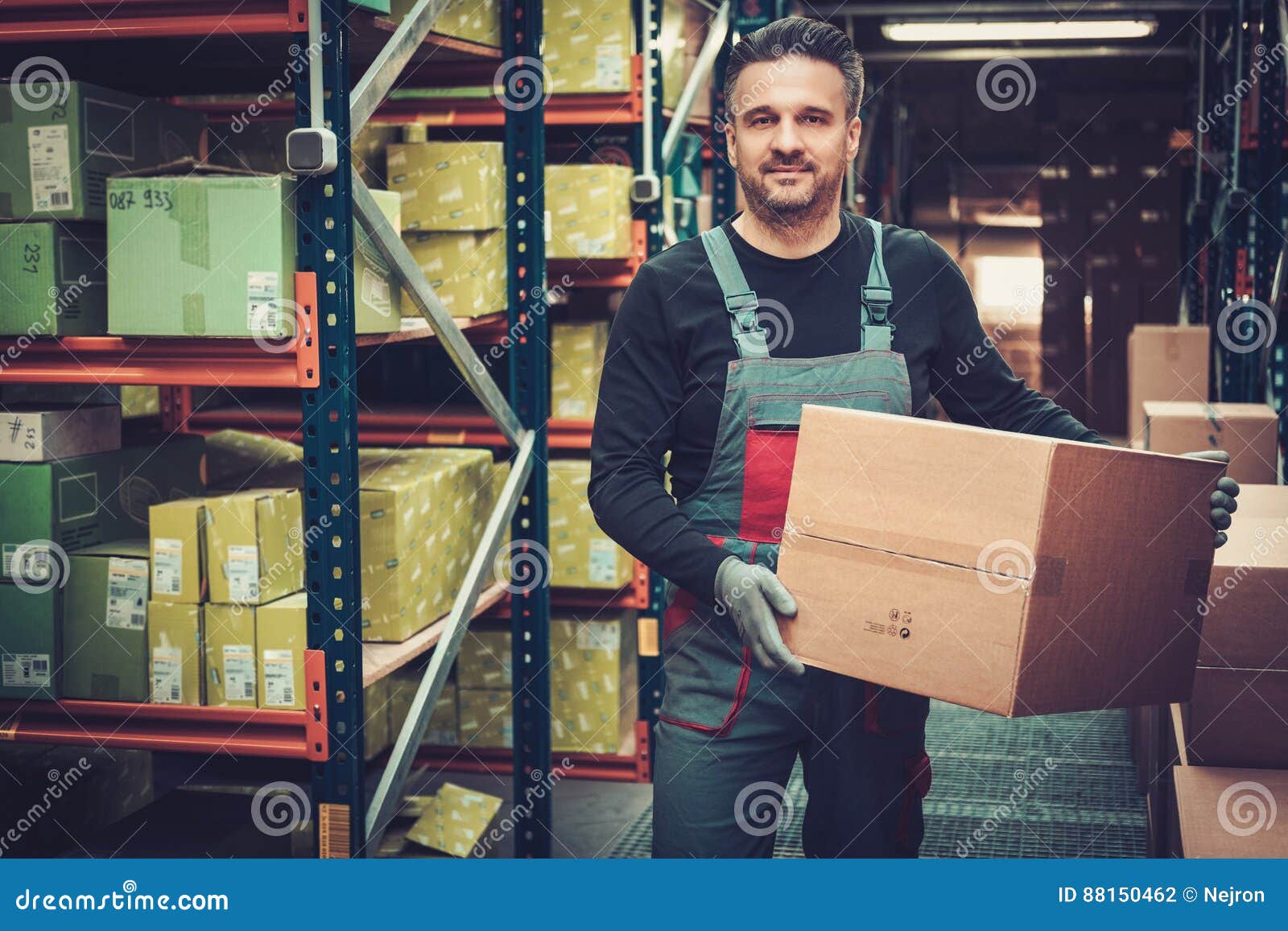 Storekeeper Working in a Warehouse Stock Photo - Image of pick ...