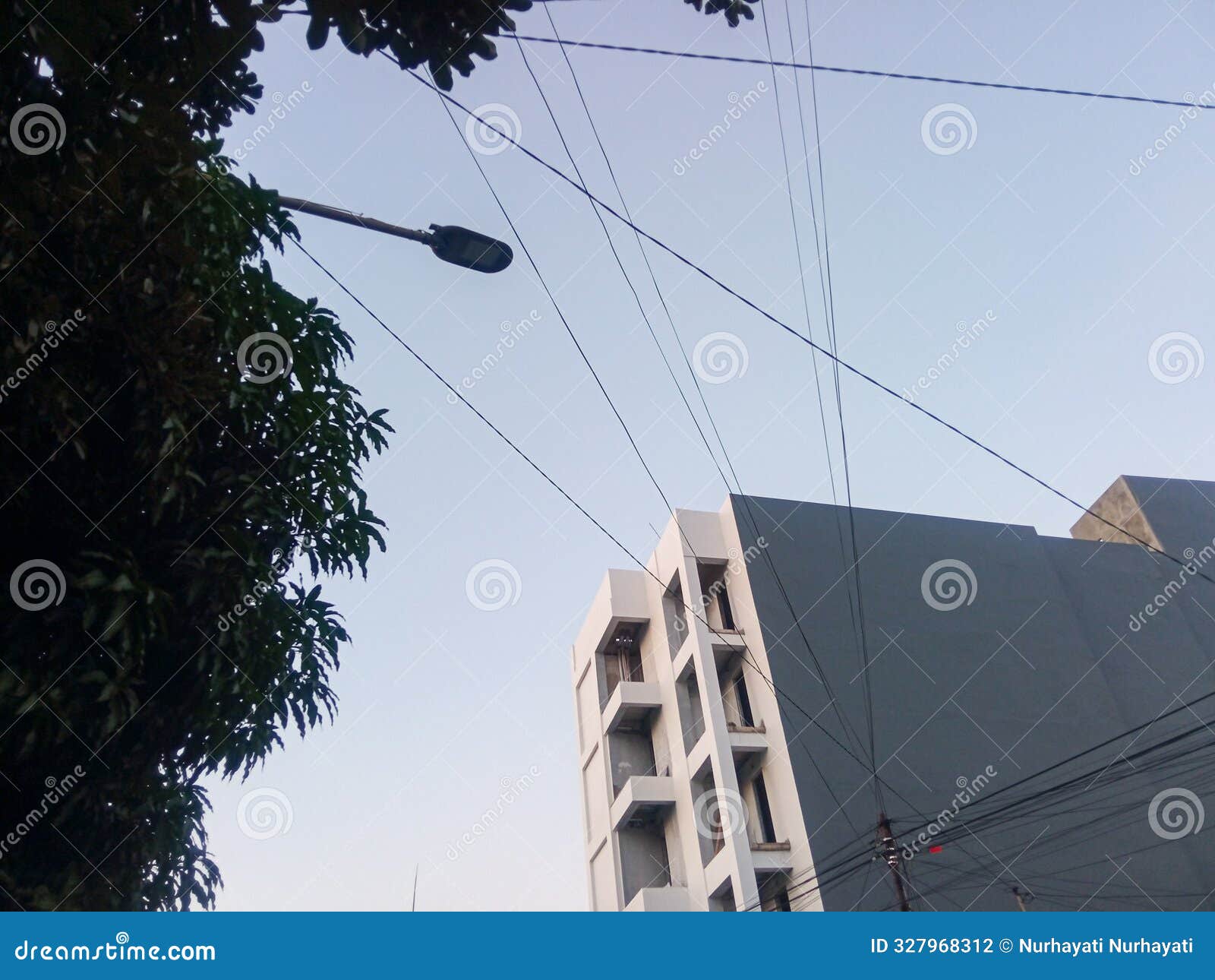 3-storey Building with Tree and Sky View Stock Photo - Image of blue ...