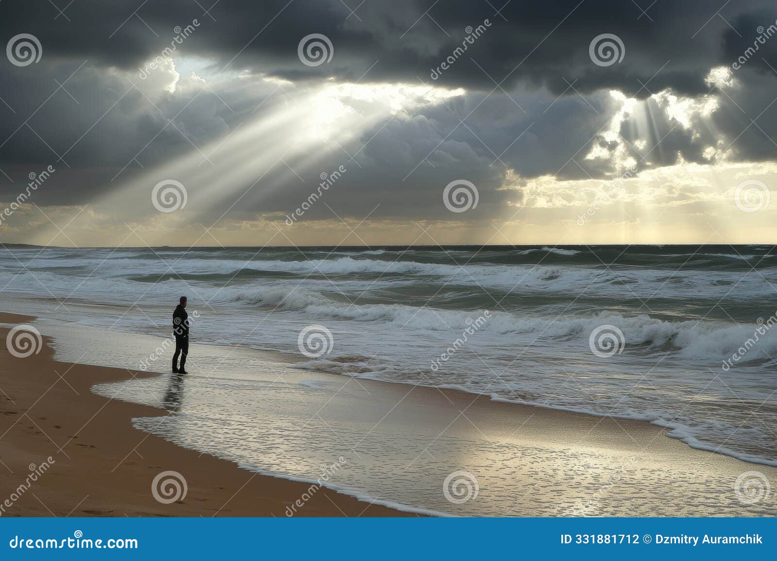 A Storm Cloud Breaks through the Sea As the Sun Shines through Stock ...