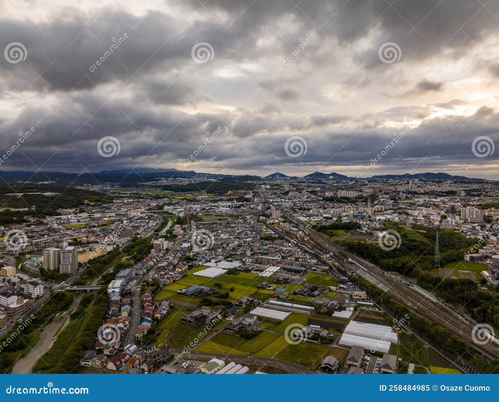 Storm Clouds Clear Over Small Town at Dawn Stock Image - Image of ...
