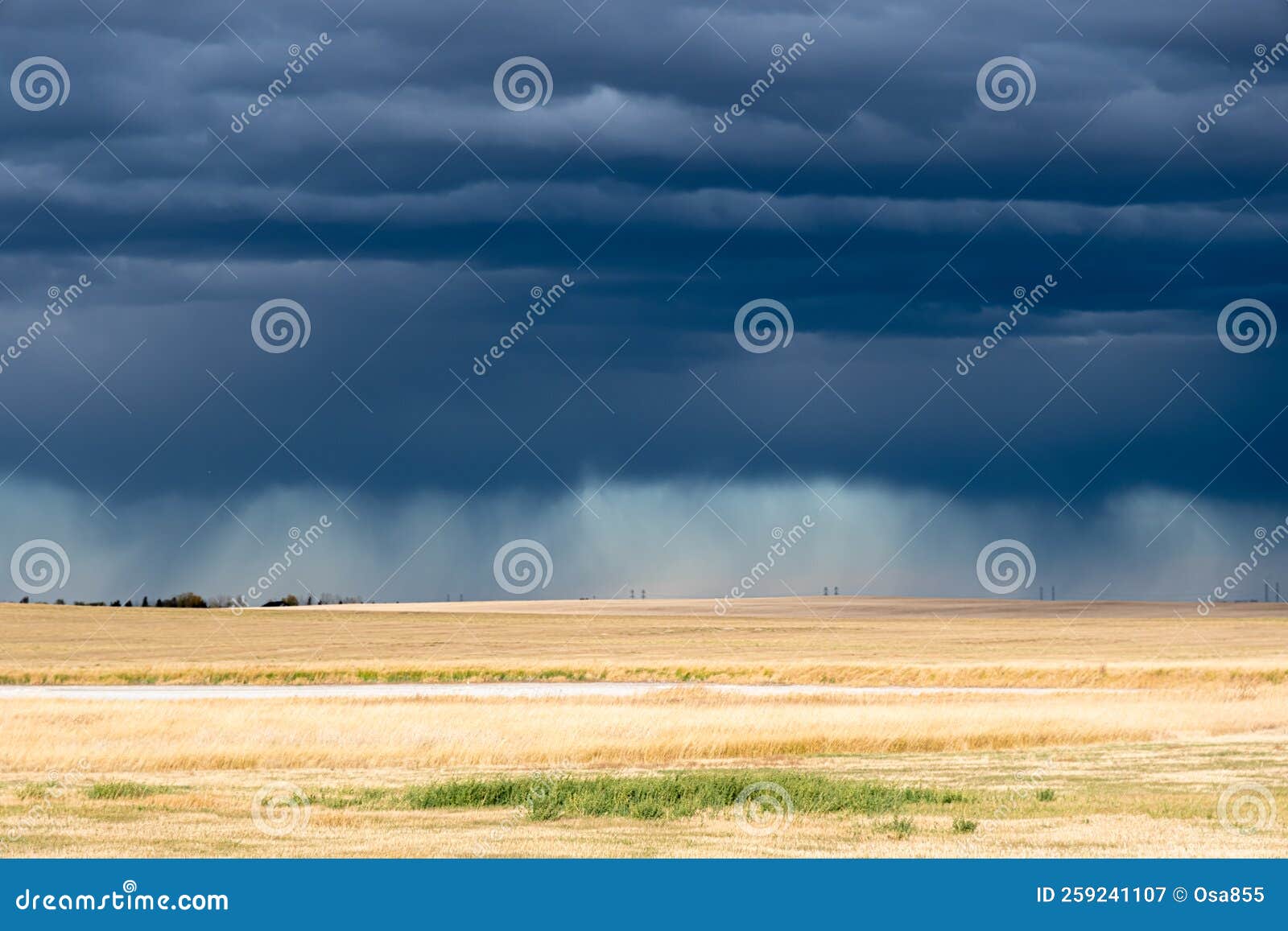 Storm Clouds Gathering Over a Farm Field in Alberta Stock Image - Image ...