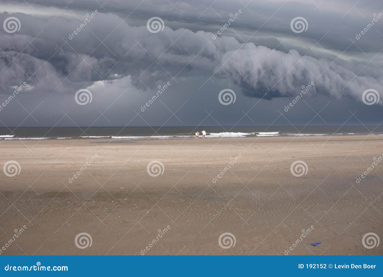 Storm clouds over beach stock photo. Image of deserted - 192152