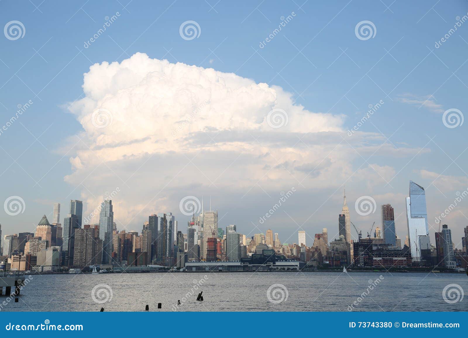 Storm Clouds over city editorial image. Image of lightning - 73743380