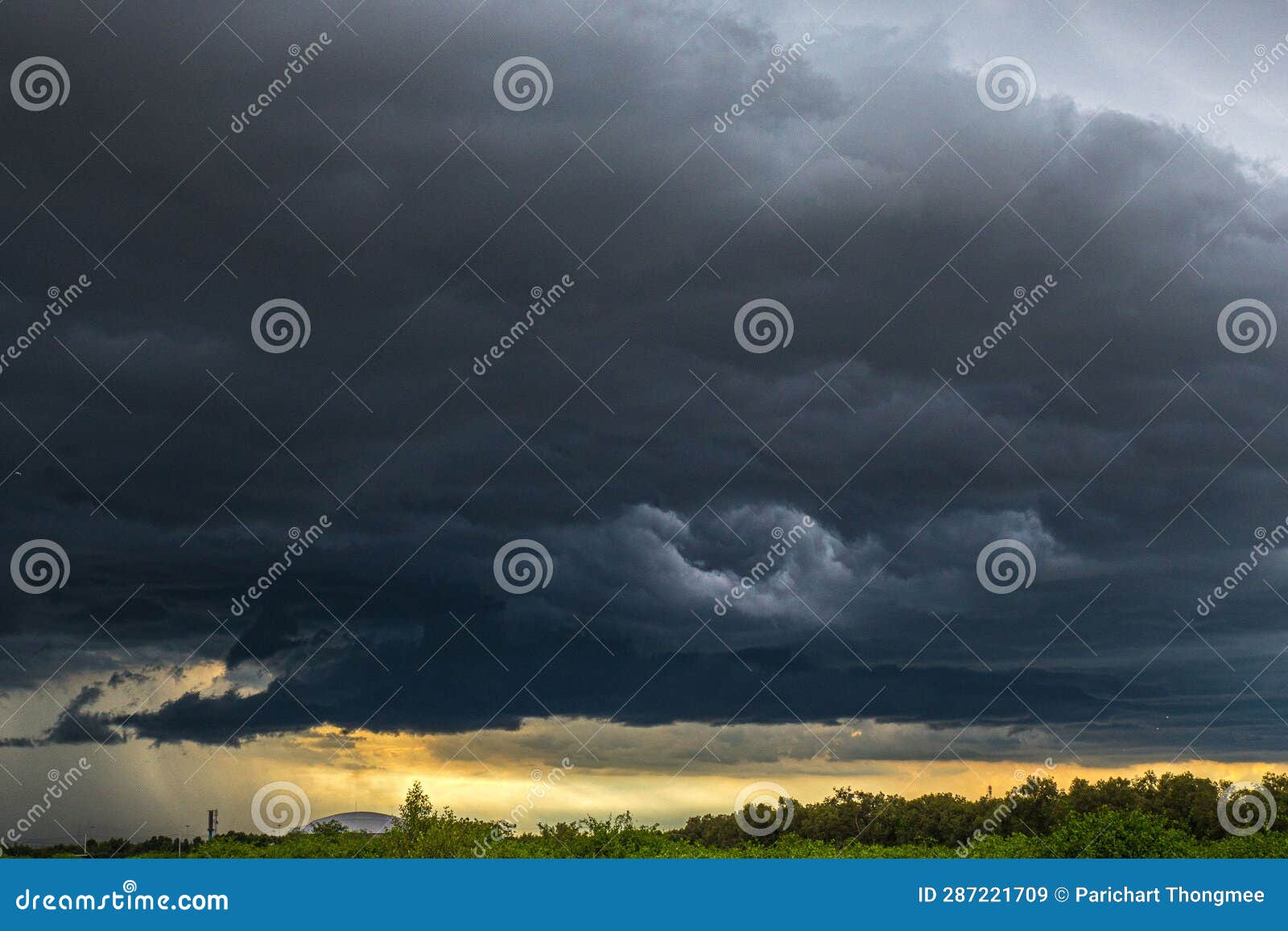 Rainfall Serenade: Moody Rainy Clouds Over a Low Tide Open Area Stock ...