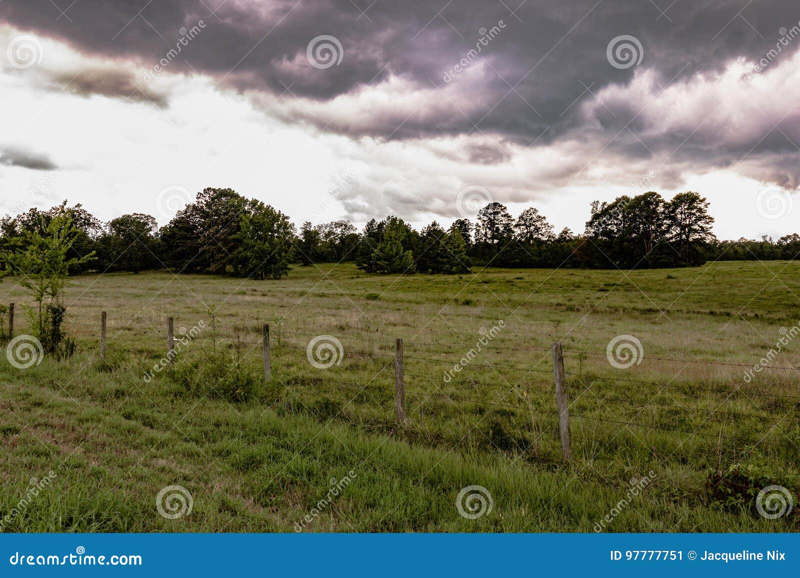 Storm Clouds Over a Pasture Stock Image - Image of natural, cloudy ...