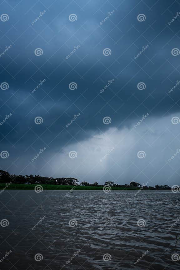 Storm Clouds Over the River Stock Image - Image of forest, weather ...