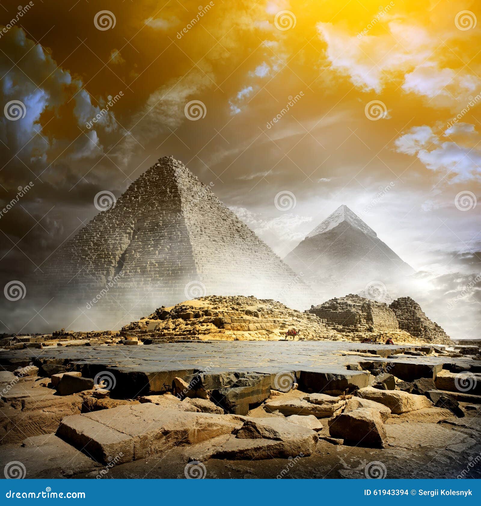 Storm clouds and pyramids stock photo. Image of desert - 61943394