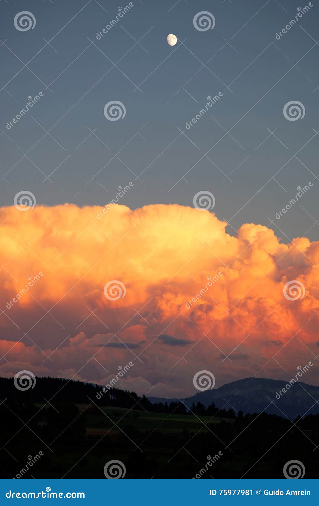Storm Clouds at Sunset with Moon Stock Image - Image of moon, cloudy ...