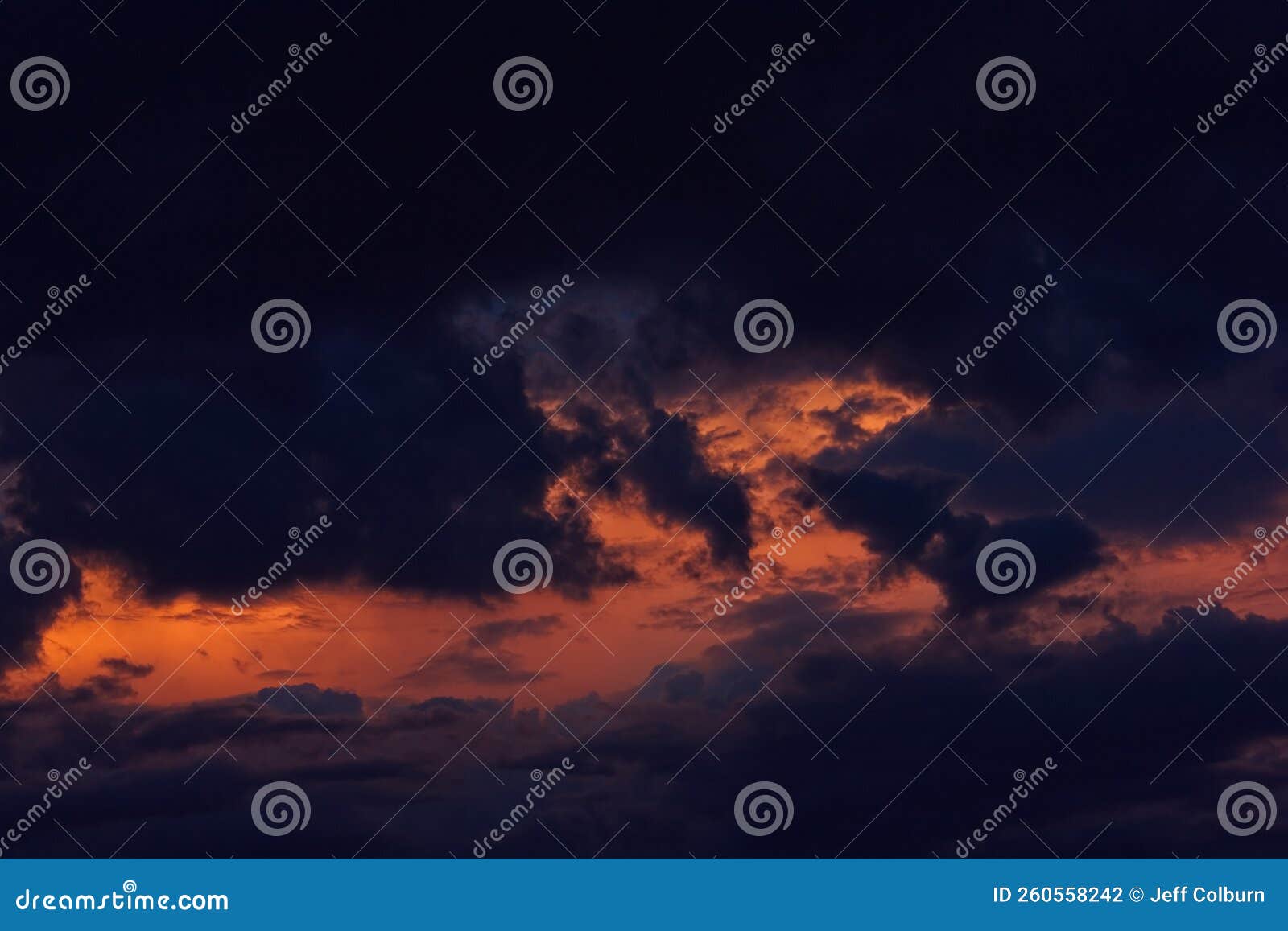 Storm Clouds after Sunset with Orange Glow Inside. Stock Photo - Image ...