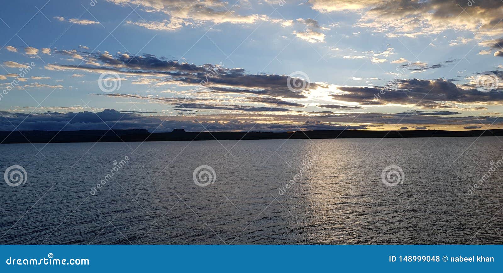 Storm in the distance stock photo. Image of sunset, storm - 148999048
