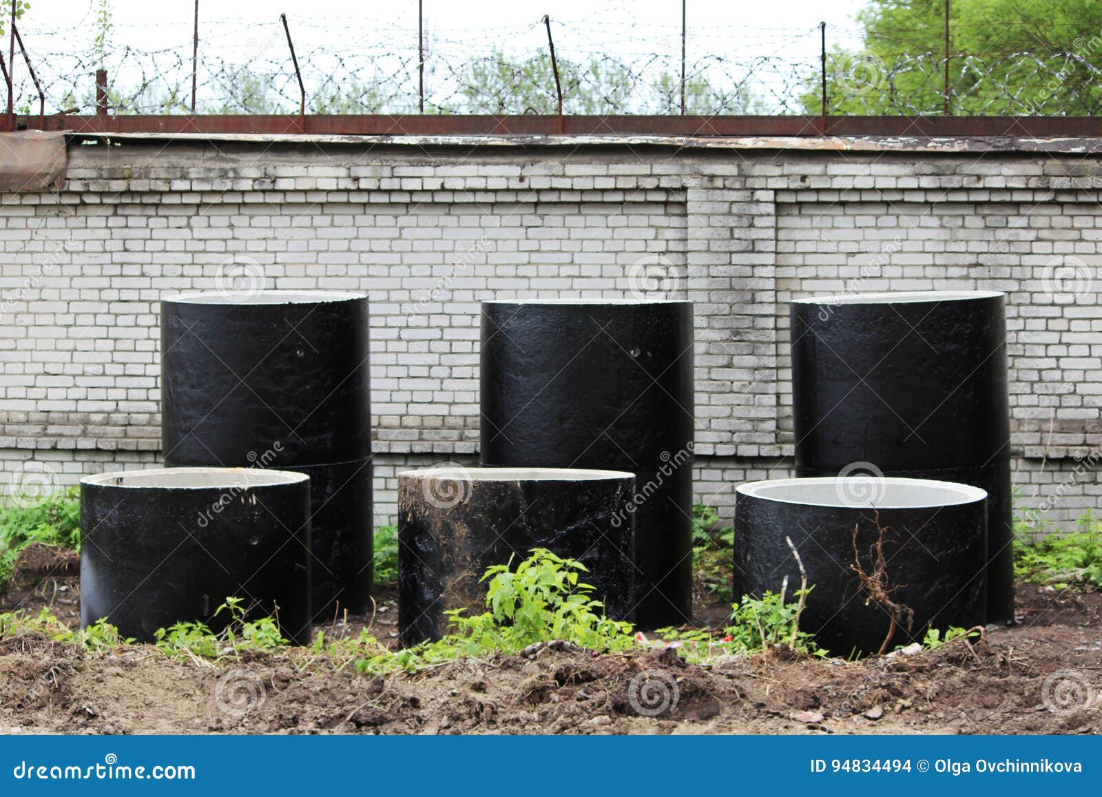 Storm Drains from Concrete Rings are in Two Rows Near the Construction ...