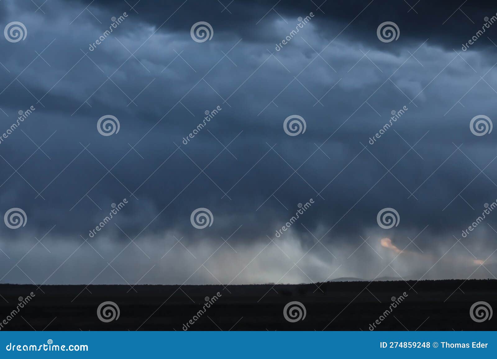 Storm Front with Dark Clouds and Rain after Sunset Stock Photo - Image ...