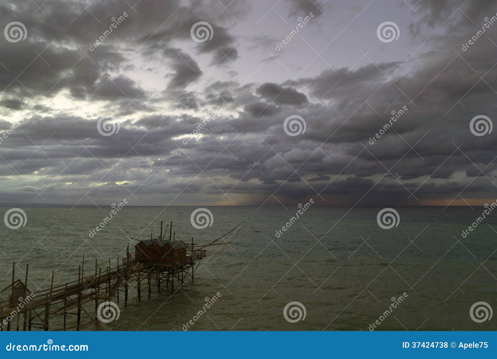 Storm on the horizon stock photo. Image of pier, evening - 37424738