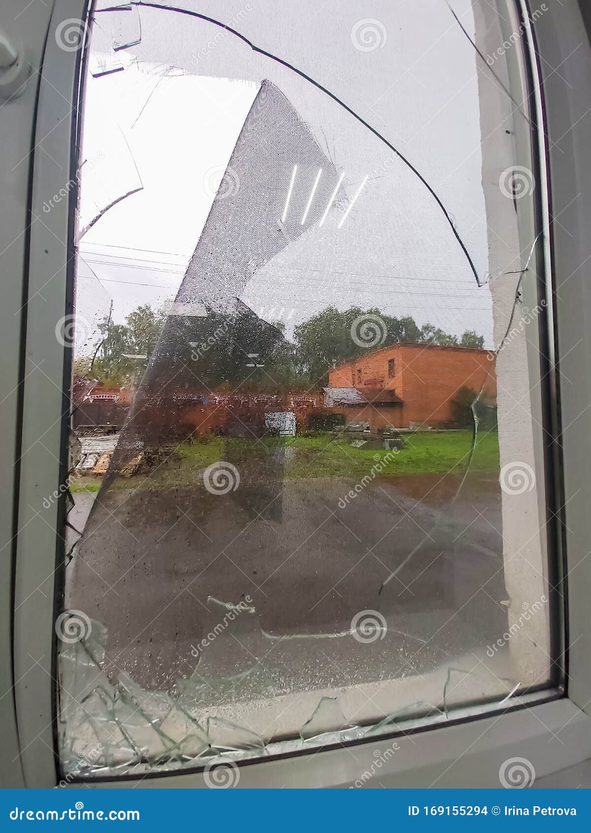 The Storm Left A Broken Window With Shards Of Glass Stock Photo - Image ...