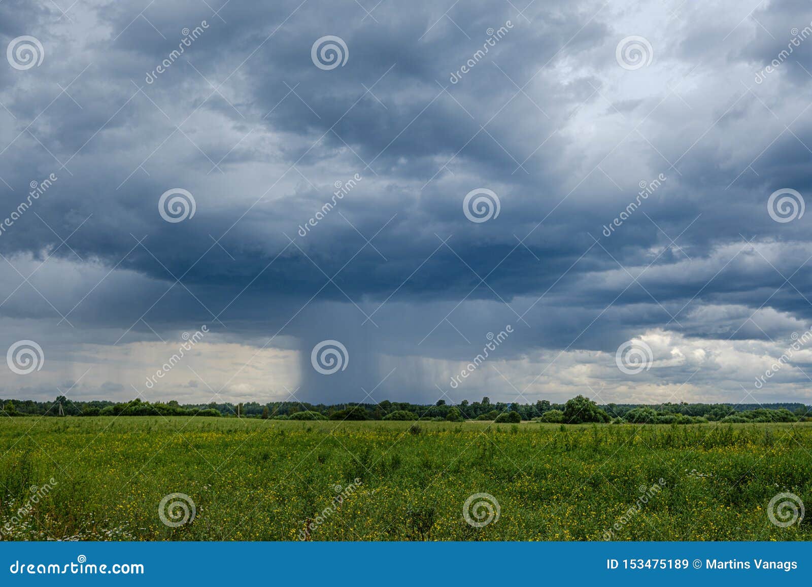 Storm Rain Clouds Forming Over the Countryside Fields in Green Summer ...
