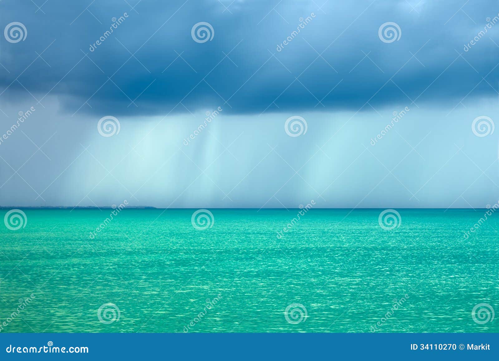 Storm Rain Clouds Over the Turquoise Sea Stock Photo - Image of ...