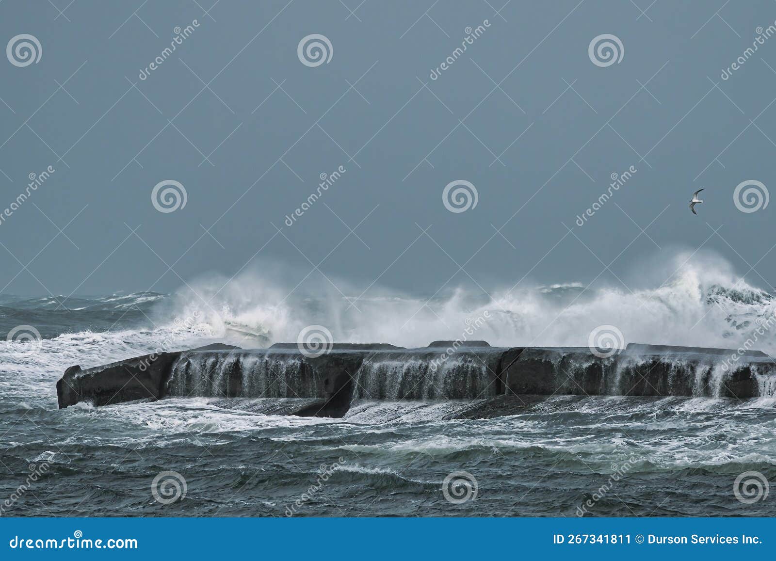 Storm Surge Creates High Waves Crashing on a Jetty Stock Image - Image ...