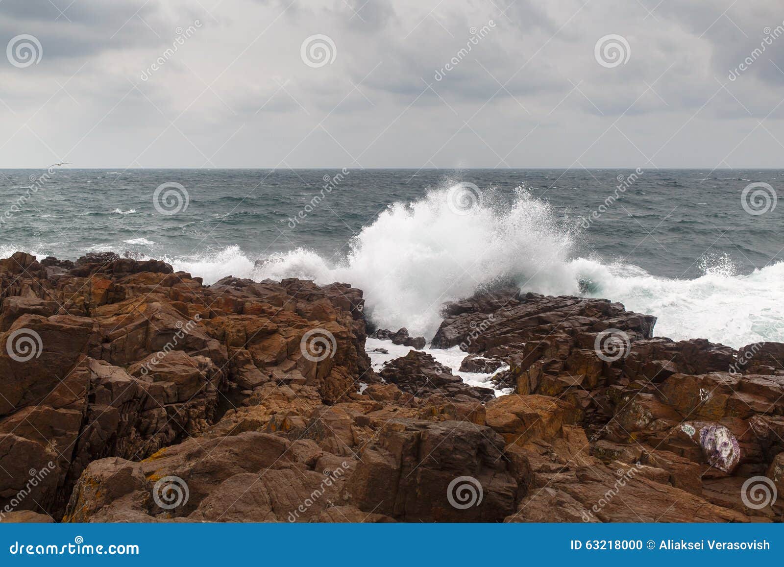 Storm wave and rocks stock photo. Image of cliffs, shore - 63218000