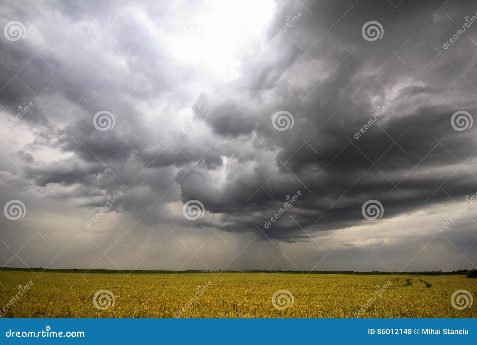 Stormy sky over the fields stock photo. Image of rainy - 86012148
