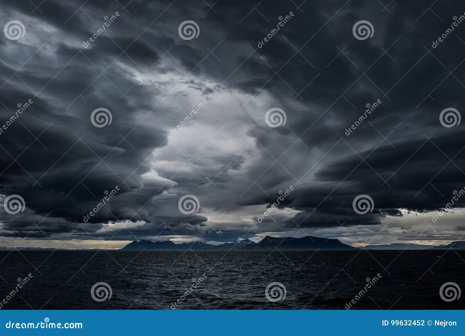 Stormy sky over an ocean stock photo. Image of cloudy - 99632452