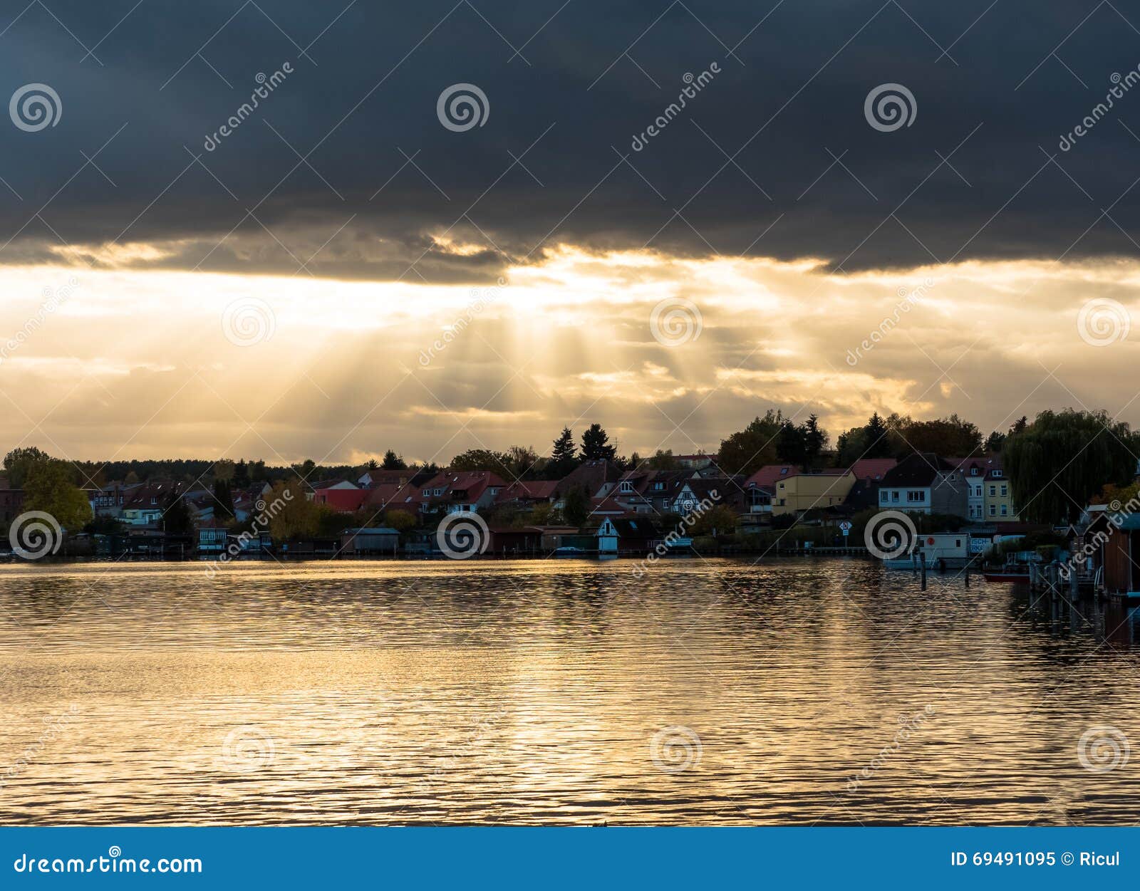 Stormy sky with sun rays stock image. Image of malchow - 69491095