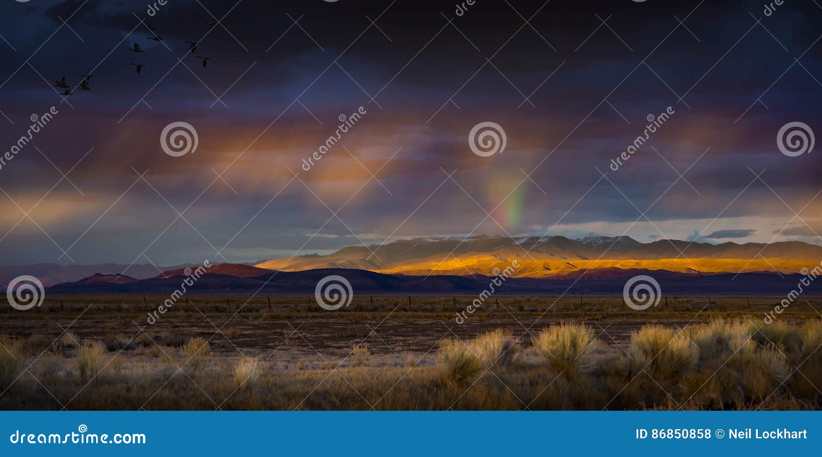 A Stormy Sunset Over Mt Larrabee And Tomyhoi Peak Royalty-Free Stock ...