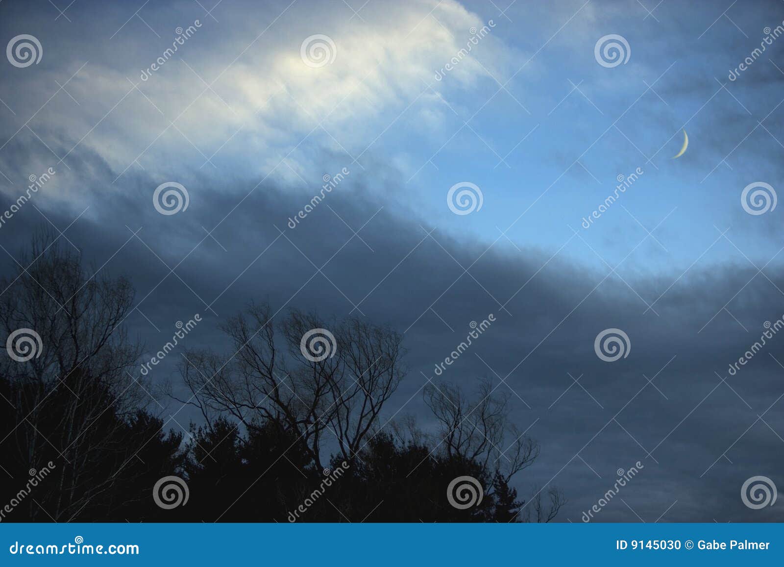 Stormy Weather Clearing with Crescent Moon Stock Photo - Image of ...