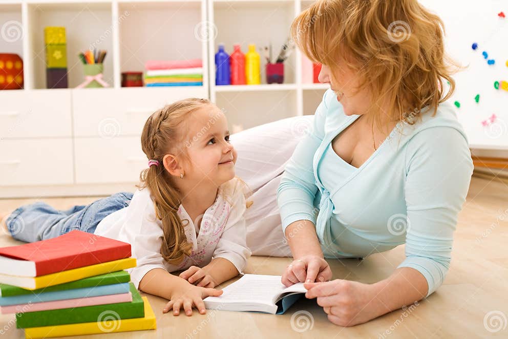 Story time with mom stock image. Image of leisure, cute - 12679171