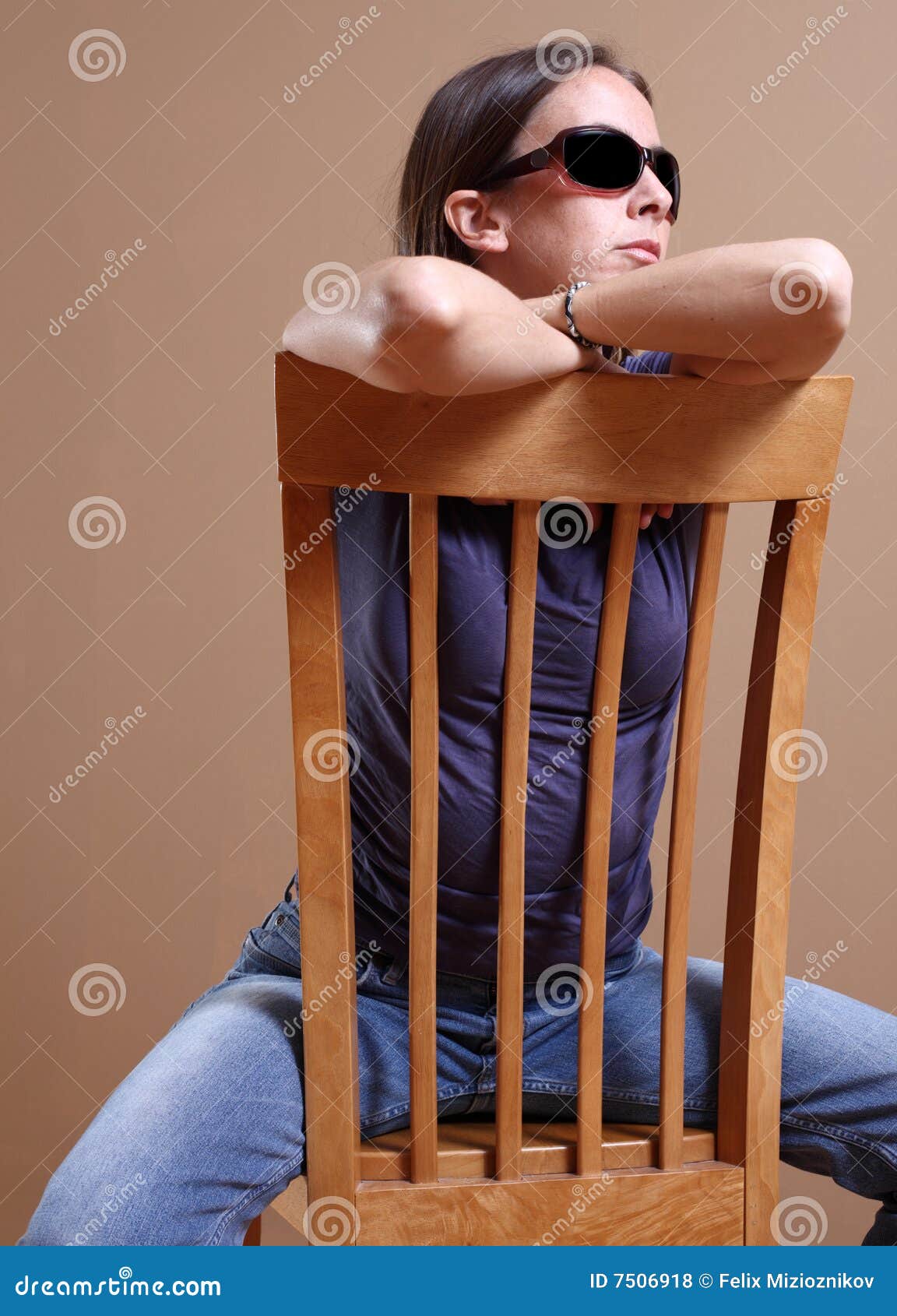 Straddling a chair stock photo. Image of legs, straddling - 7506918