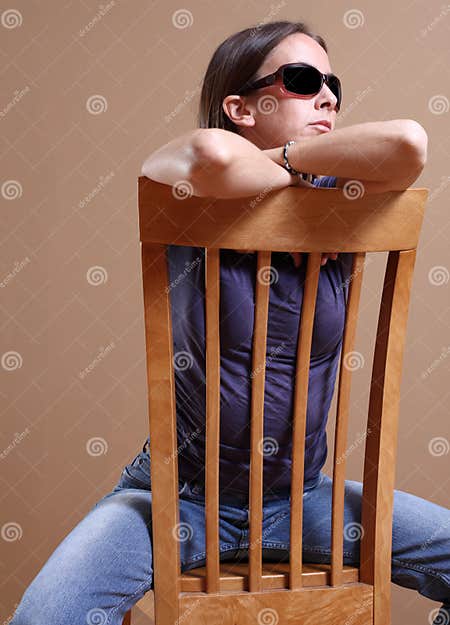 Straddling a chair stock photo. Image of legs, straddling - 7506918