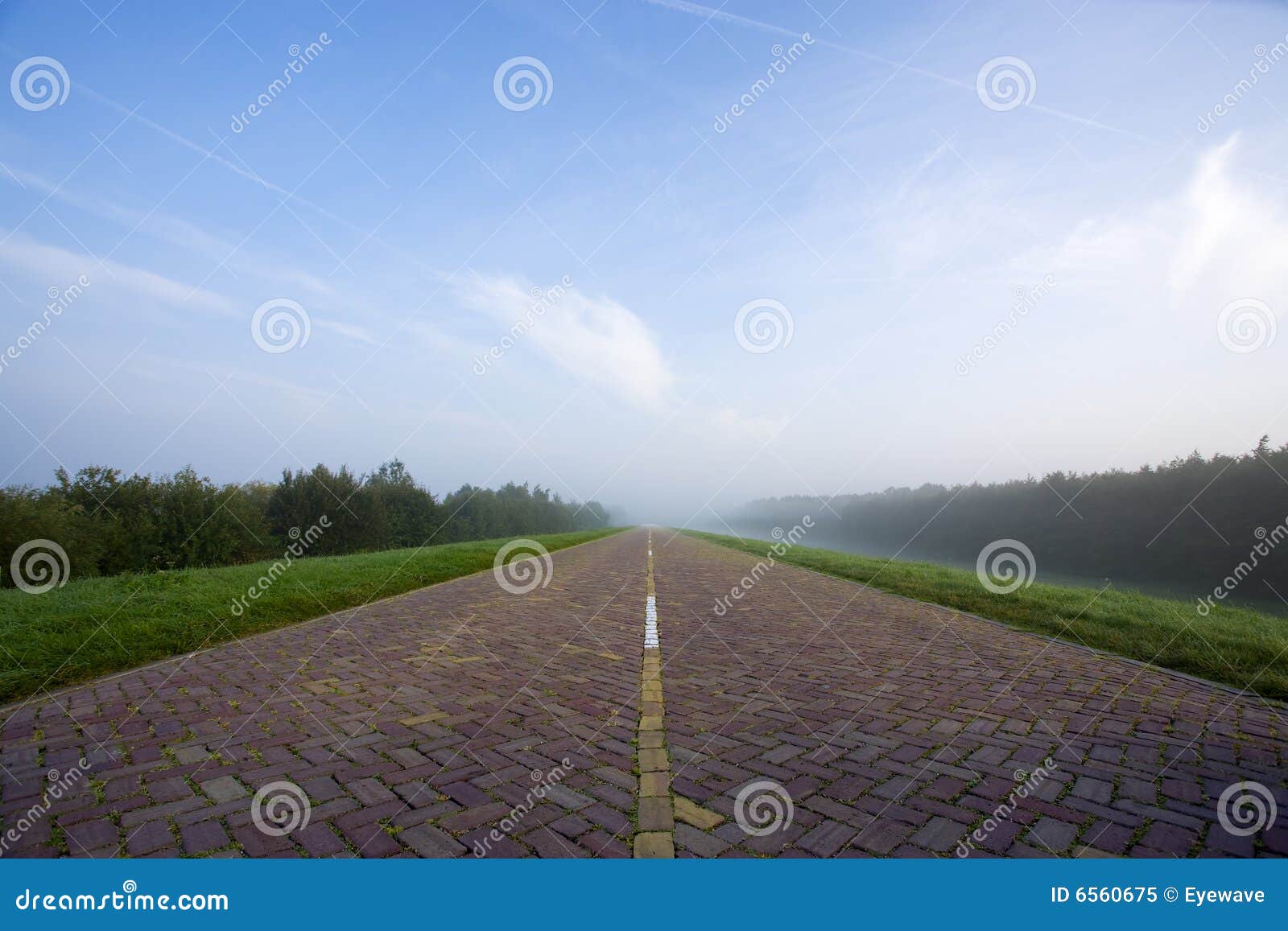 Straight brick road stock image. Image of blue, endless - 6560675