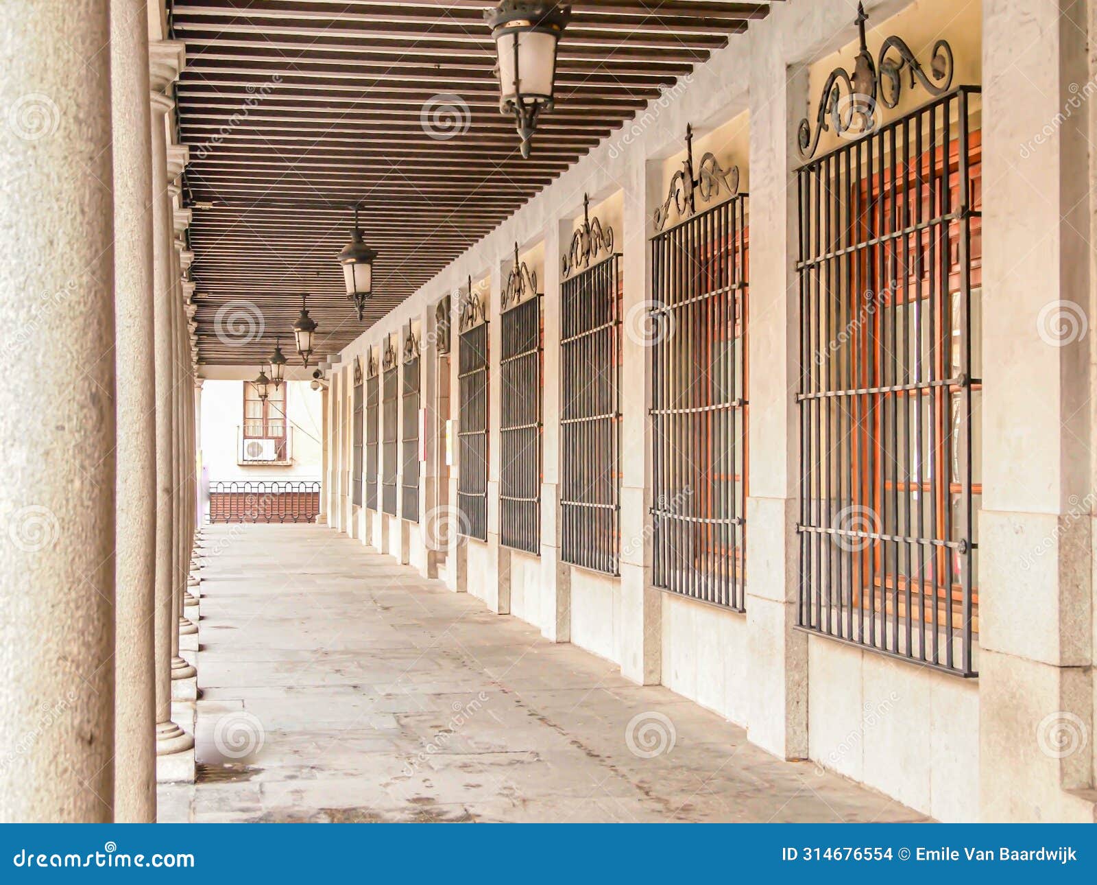 Straight Corridor between Pillars and Wall with Windows in an Old ...