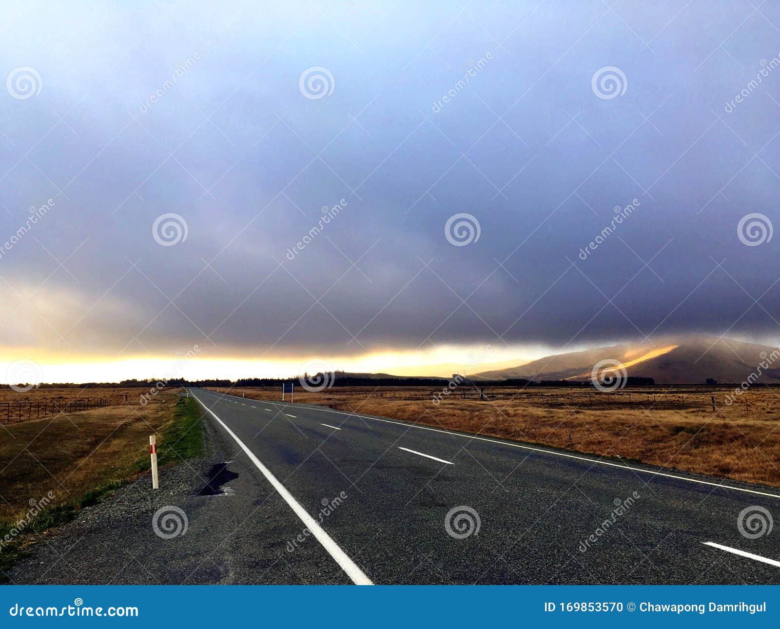 A road with storm ahead stock photo. Image of outdoors - 169853570